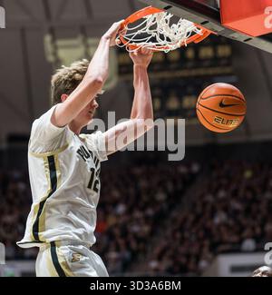 Purdue center Daniel Jacobsen (12) rebounds the ball against Wisconsin ...