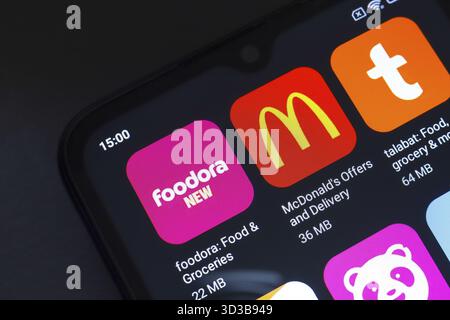 In this photo illustration the Talabat logo seen displayed on a ...