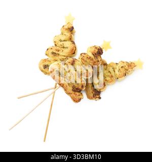 Christmas tree shaped snacks made with puff pastry, pesto sauce, cheese ...