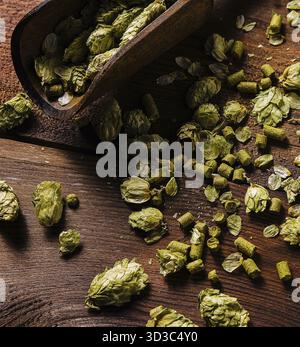 Fresh green hops on a wooden table. close up Stock Photo - Alamy