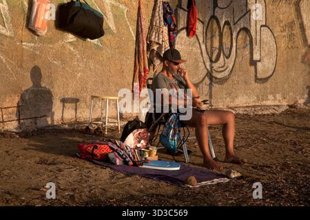 kavouri beach at sunset vouliagmeni athens riviera athens greece Stock ...