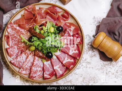 Traditional spanish jamon, prosciutto crudo, italian salami, parma ham ...