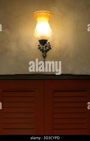 This rustic background features a concrete wall where white paint has ...