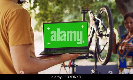 Young multiethnic couple having a bike ride in nature Stock Photo - Alamy