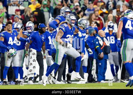 Seattle Seahawks safety Ty Okada (39) runs during an NFL football game ...