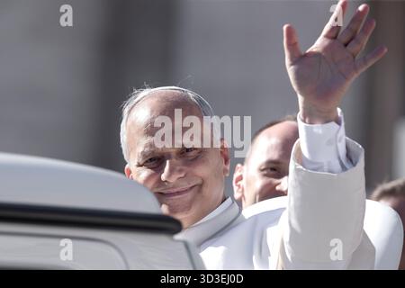 Pope Leo XIV leaves at the end of his weekly general audience in St ...