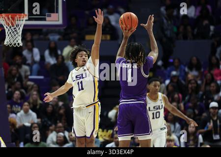 LSU guard Dedan Thomas Jr., right, looks to pass against Texas Tech ...