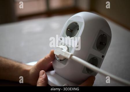 Introducing a modern power strip with multiple outlets for efficient ...