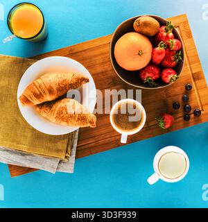 Delightful Breakfast Spread Featuring Croissants and Cereals With Fresh ...