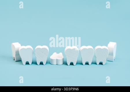 Wooden models of teeth, a place for text, concepts of dental treatment ...