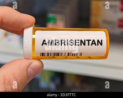 orange plastic Box of AMBRISENTAN tablets on a hospital pharmacy table ...