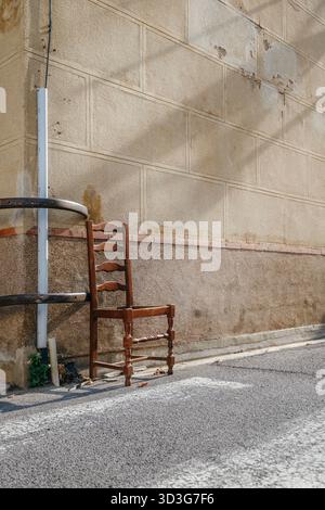 Old abandoned wooden chair, detail of ruin and loneliness Stock Photo ...