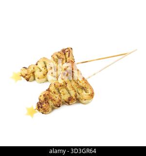 Christmas tree shaped snacks made with puff pastry, pesto sauce, cheese ...