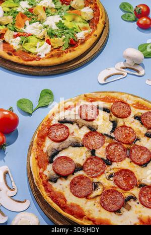 Food, Fresh tasty pizzas on top view Stock Photo - Alamy