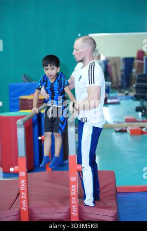 Young gymnasts training at Premier Gymnastics academy in Qatar. They ...