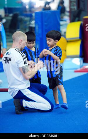 Young gymnasts training at Premier Gymnastics academy in Qatar. They ...