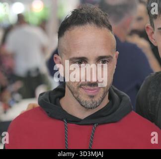 The Eicma Girls, a parade of models riding high-quality motorcycles at ...