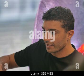 The Eicma Girls, a parade of models riding high-quality motorcycles at ...