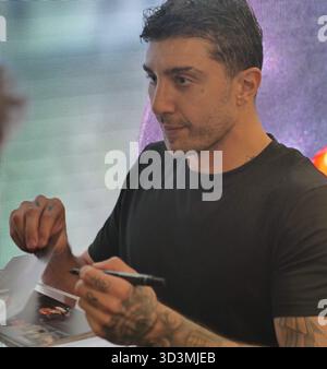 The Eicma Girls, a parade of models riding high-quality motorcycles at ...