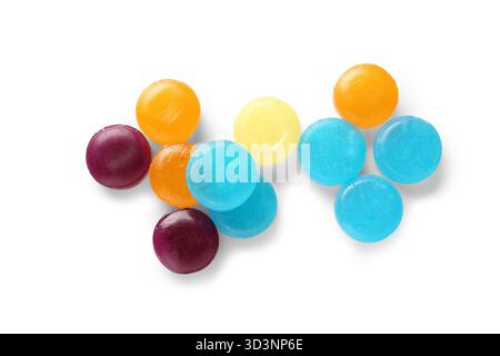 Many different color cough drops on white background Stock Photo - Alamy