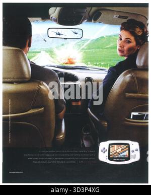 Boy is playing video games with a retro computer gaming in the living ...