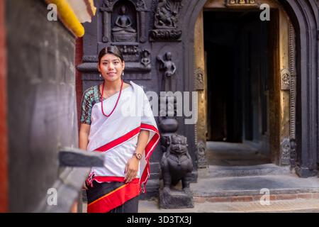 Newari Girl in Traditional Attire at the Golden Temple Patan Durbar ...