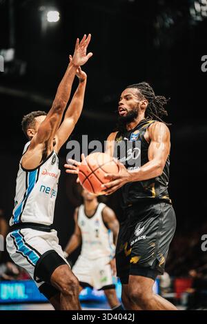 Chip Flanigan (Basketball Lions Braunschweig, #30) is blocked by Jonas ...