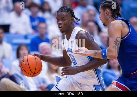 North Carolina forward Caleb Wilson (8) dunks during the first half of ...