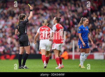 Referee Melissa Burgin shows a yellow card during the Barclays Women's ...