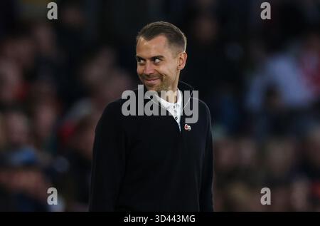 Southampton interim head coach Tonda Eckert applauds the fans after the ...
