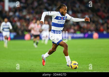 Queens Park Rangers' Rumarn Burrell (left) and Blackburn Rovers' Kristi ...