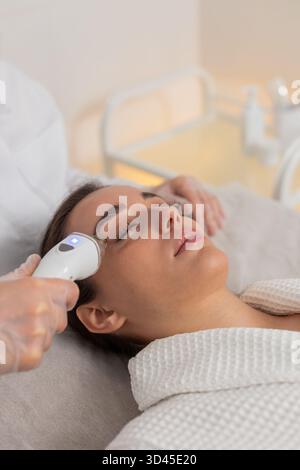 Cosmetologist makes RF lifting for rejuvenation woman face, anti aging ...