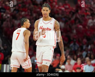 Houston center Chris Cenac Jr. (5) passes the ball against New Orleans ...