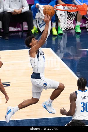Dallas Mavericks guard Max Christie warms up before an NBA basketball ...