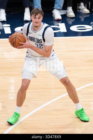 Dallas Mavericks forward Cooper Flagg dribbles the ball up court during ...