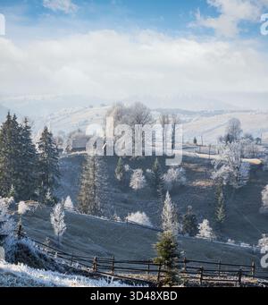 Winter coming. Picturesque foggy and moody morning scene in late autumn ...
