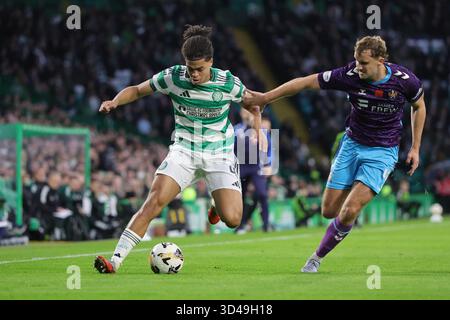 Celtic's Jahmai Simpson-Pusey (left), Daizen Maeda and Shin Yamada with ...