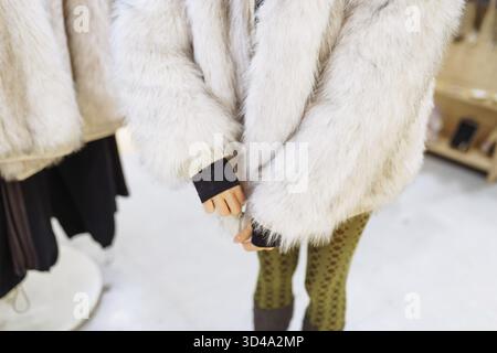 young female trying zip up pants Stock Photo - Alamy