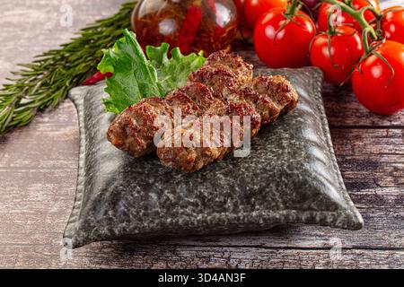 Two pieces Grilled beef kebab minced meat Stock Photo - Alamy