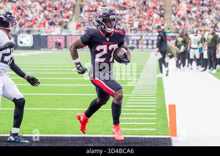 Houston Texans running back Woody Marks (27) celebrates in the end zone ...