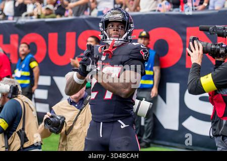 Houston Texans running back Woody Marks (27) warms up before an NFL ...