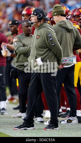 Washington Commanders head coach Dan Quinn speaks after an NFL football ...