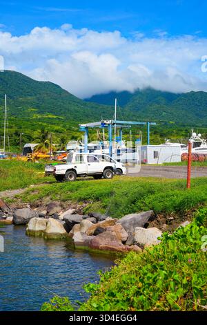 Boatyard and dry-dock boat storage in New Guinea town on the west coast ...