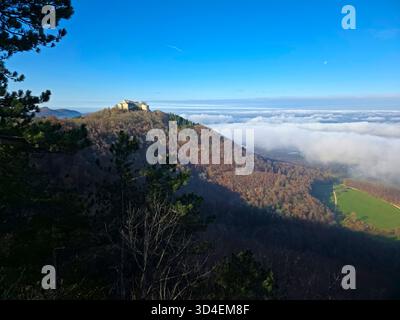 A sea surrounded by forested mountains Stock Photo - Alamy