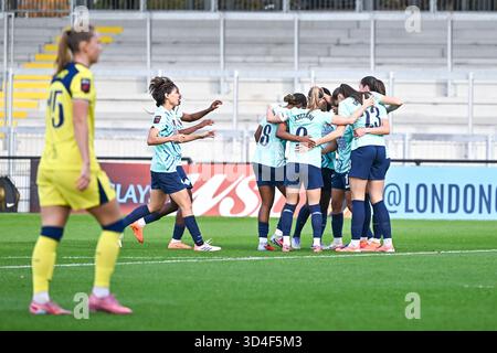London, UK. 17 November 2025. A staff member with Vending machines from ...