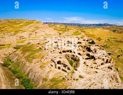 Uplistsikhe aerial panoramic view. Uplistsikhe is an ancient rock hewn ...
