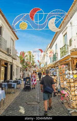 Pedestrians walk beneath street decorations ahead of the 2026 FIFA ...
