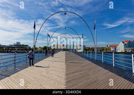 The Queen Emma Bridge is a floating pontoon bridge that connects the ...