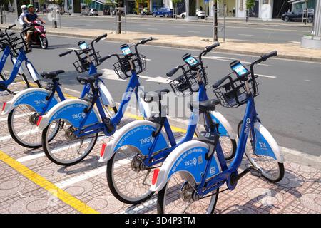 Bicycle rental in Ho Chi Minh City, Vietnam Stock Photo - Alamy