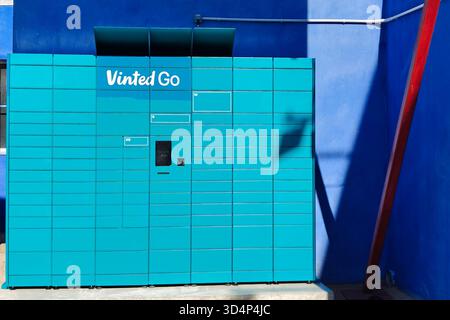 Finestrat, Spain- 10 November 2025: Woman using Vinted go locker ...
